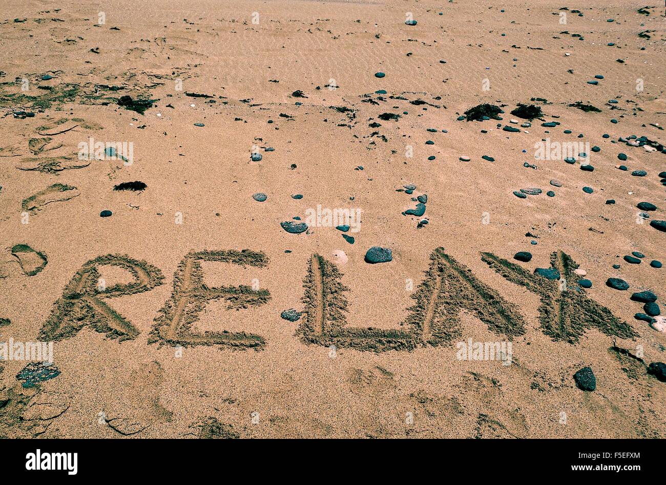Script in sand hi-res stock photography and images - Alamy