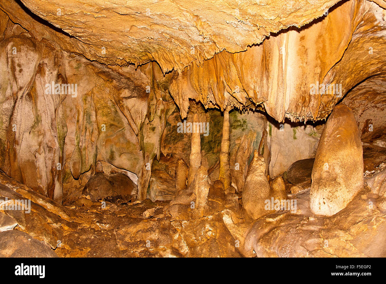 Inside view of an underground cavern or cave with stalagmites and ...