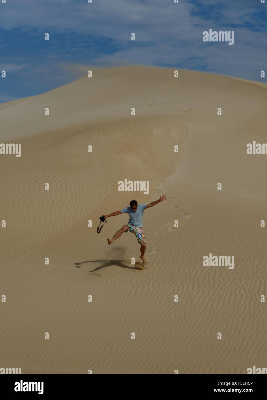 Australia man running on sand hi-res stock photography and images - Alamy