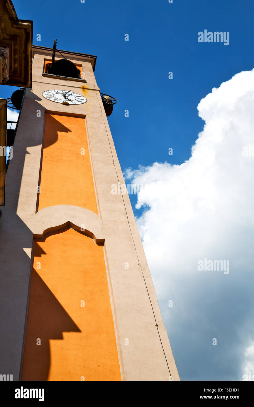 ancien clock tower in italy europe old stone and bell Stock Photo - Alamy
