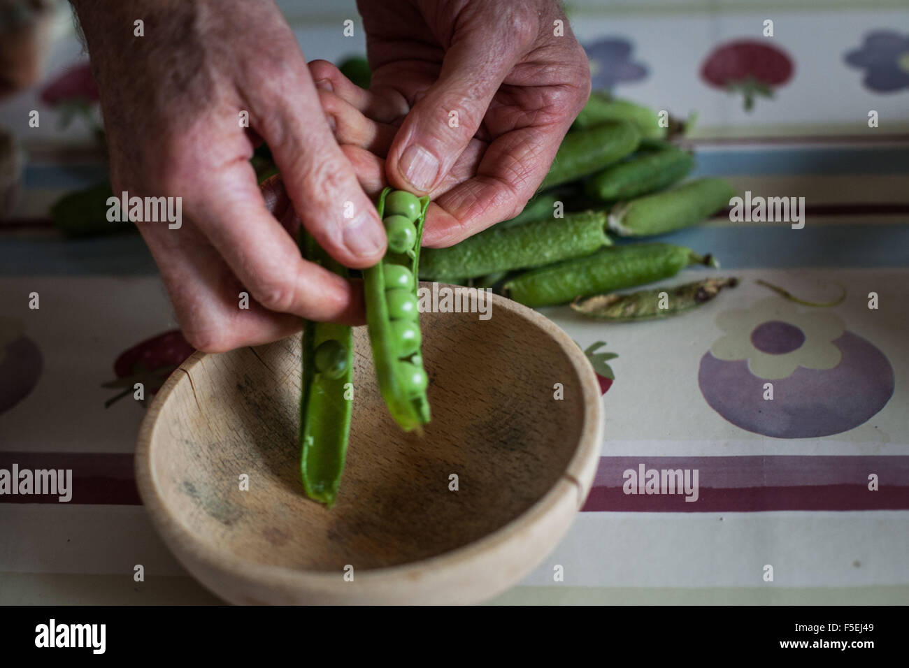 Man eating peas not woman hi-res stock photography and images - Alamy