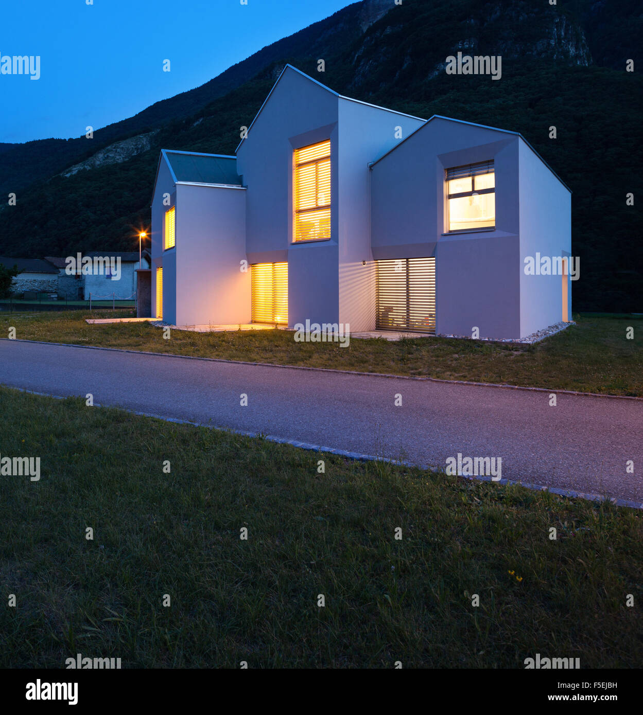 architecture, country houses on the street by night Stock Photo - Alamy