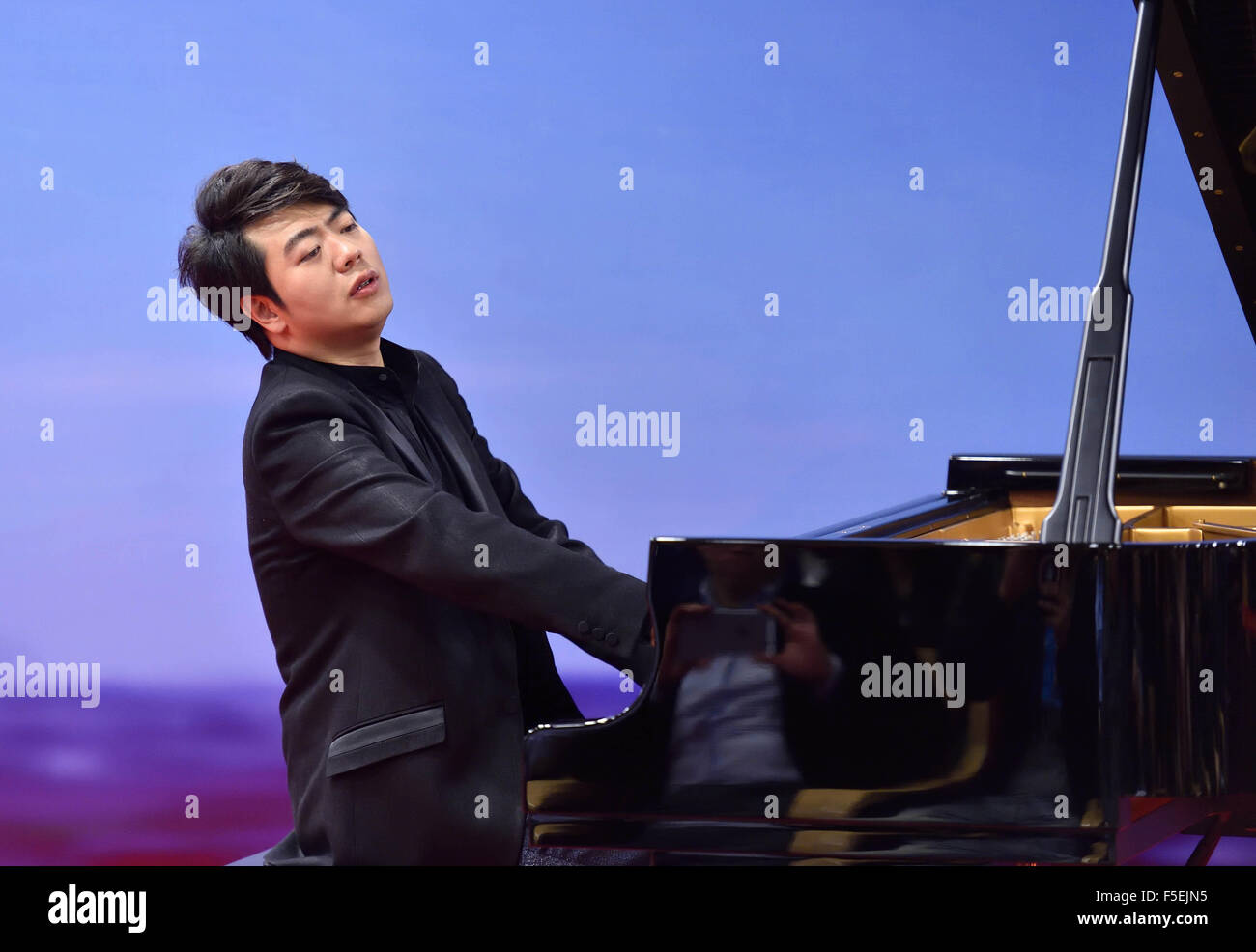 Beijing, China. 3rd Nov, 2015. Pianist Lang Lang plays the piano during ...