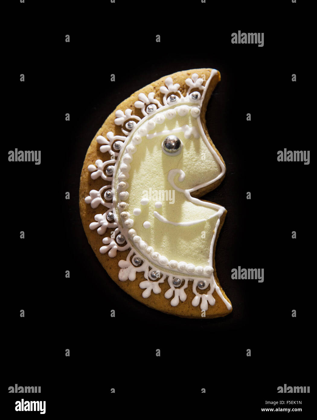 Tasty gingerbread moon on the dark background. Christmas theme. Bakery ...