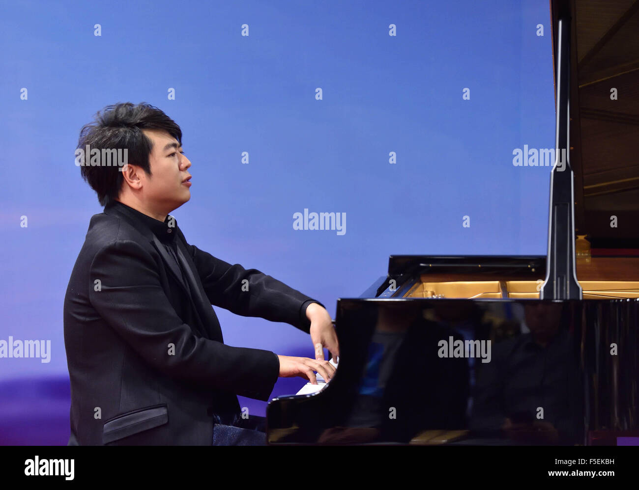 Beijing, China. 3rd Nov, 2015. Pianist Lang Lang plays the piano during ...