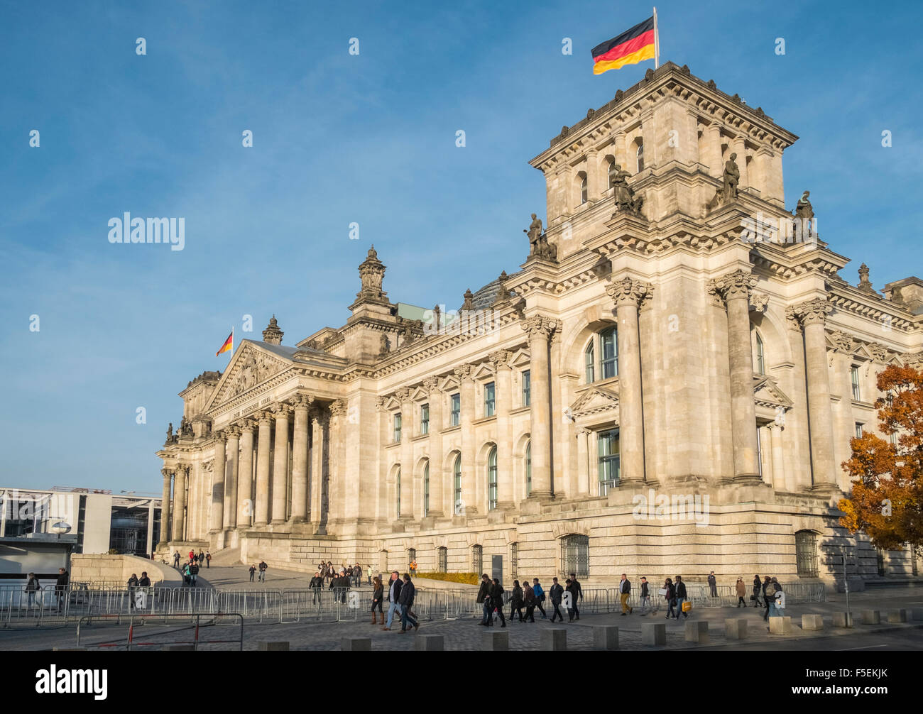 Front facade of German Reichstag building in late afternoon sunlight ...