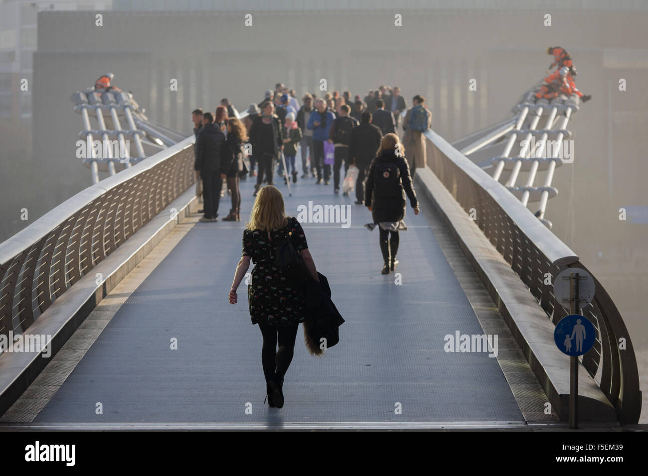 A cleaning crew with the contractor Conroy wash down surfaces on the ...