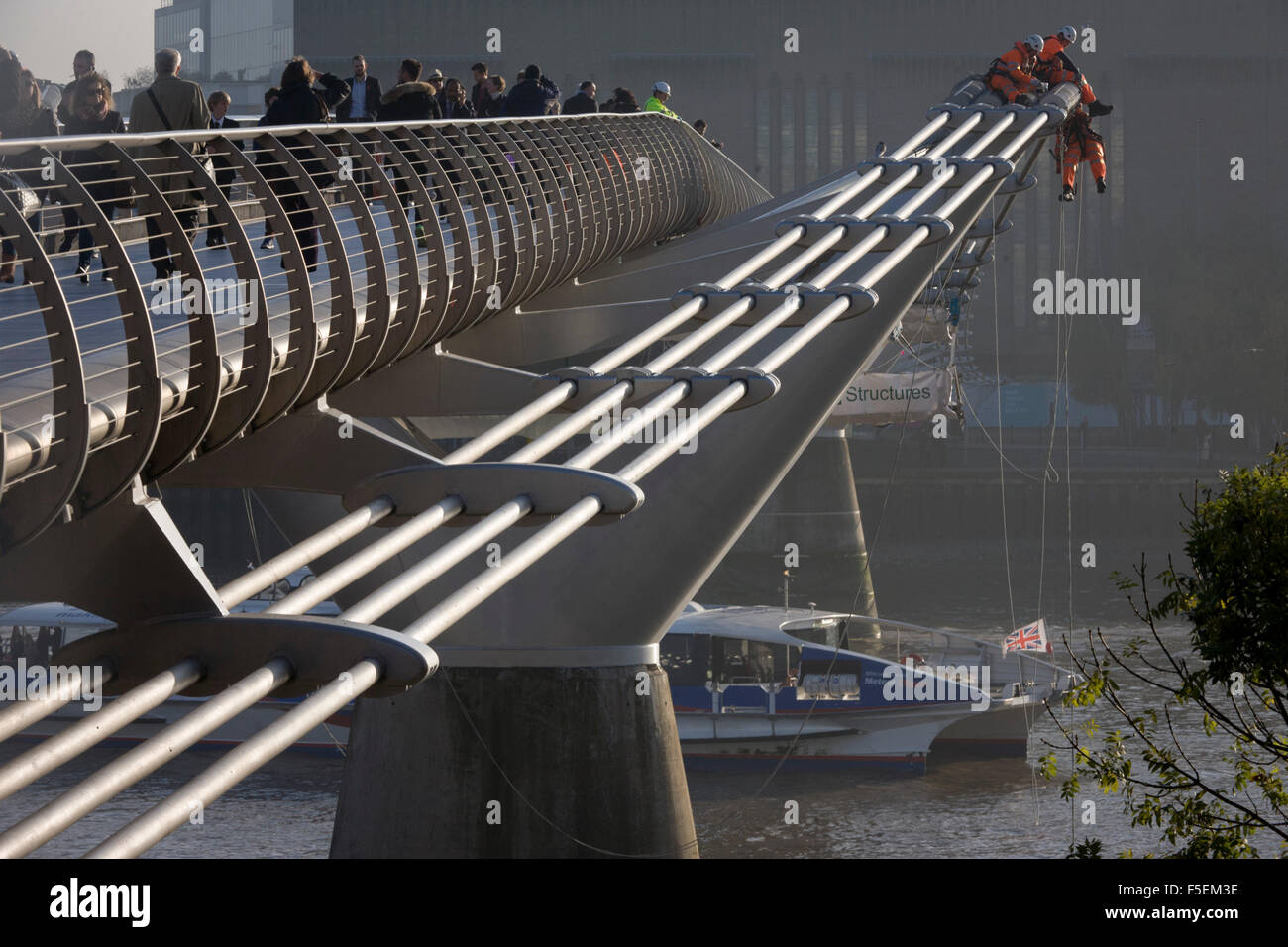 A cleaning crew with the contractor Conroy wash down surfaces on the ...