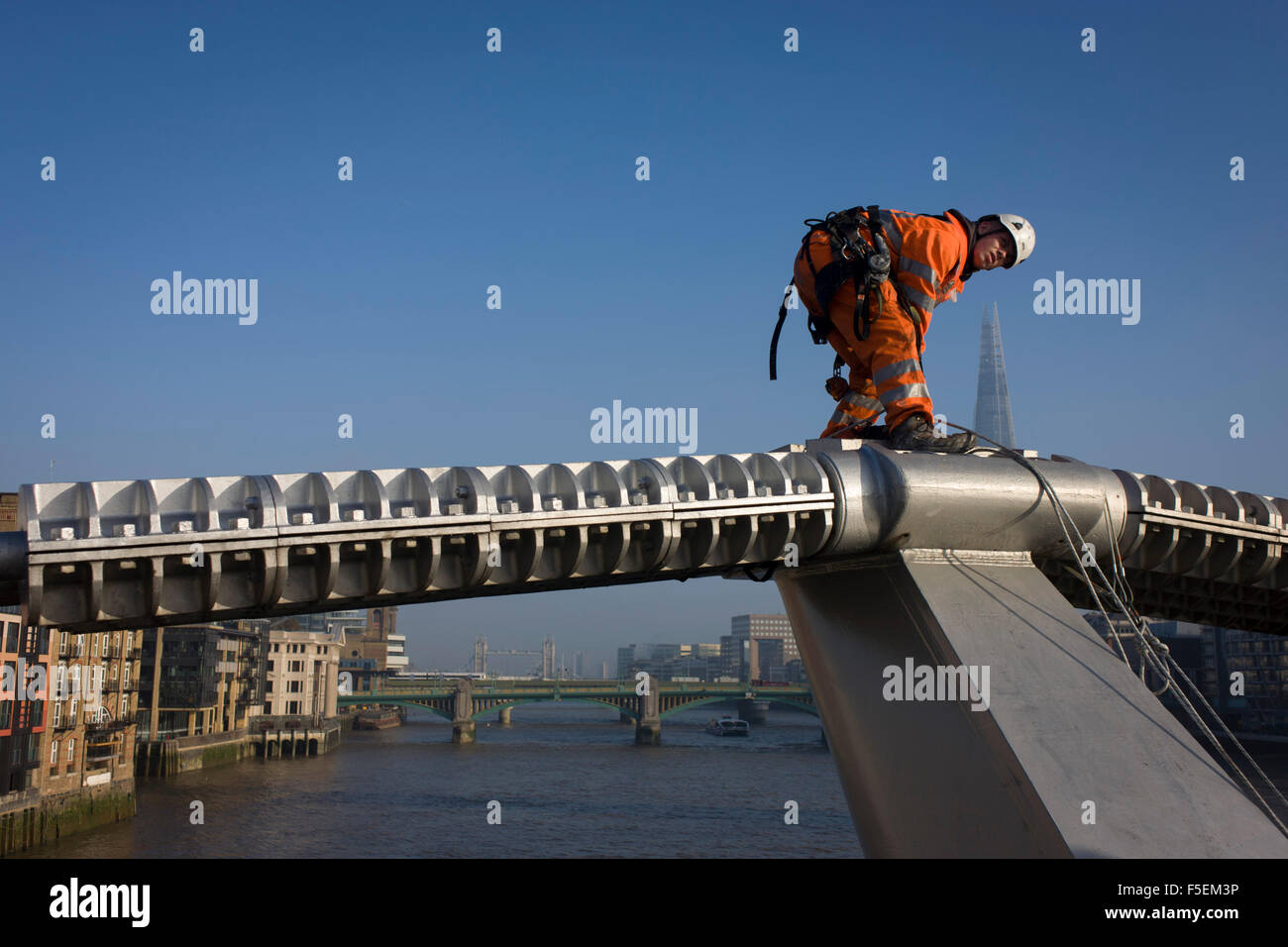 A cleaning crew with the contractor Conroy wash down surfaces on the ...