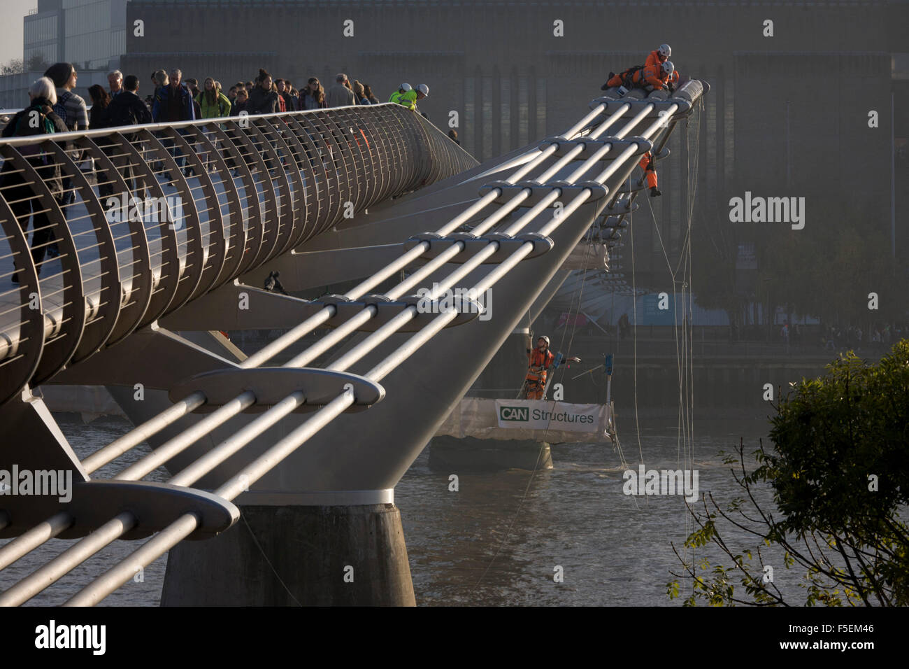 A cleaning crew with the contractor Conroy wash down surfaces on the ...