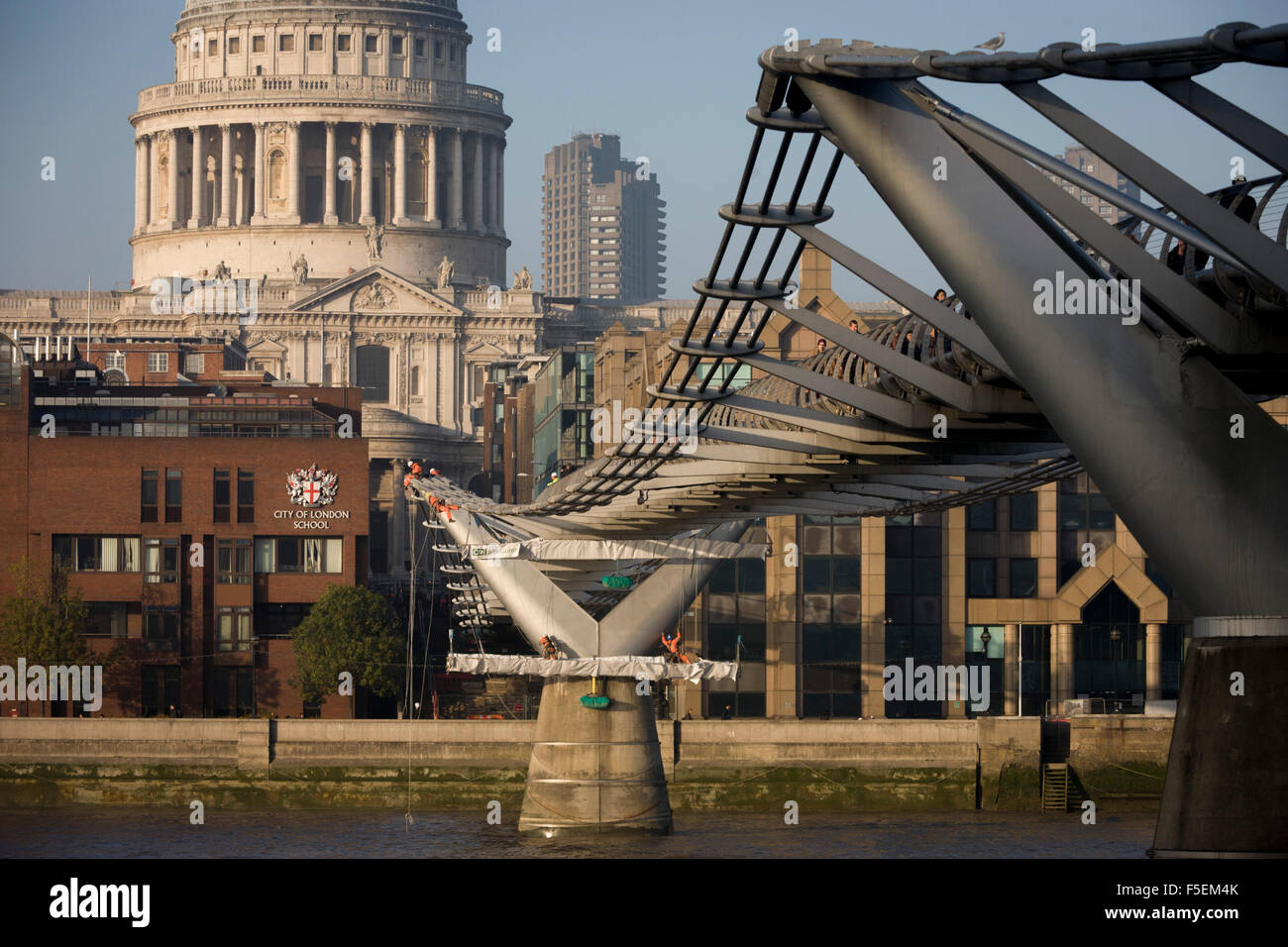 A cleaning crew with the contractor Conroy wash down surfaces on the ...