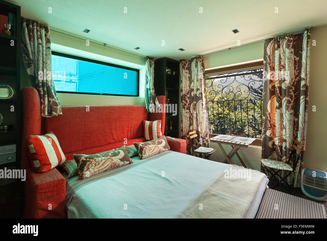 guest room of an house, double bed with pool window Stock Photo - Alamy