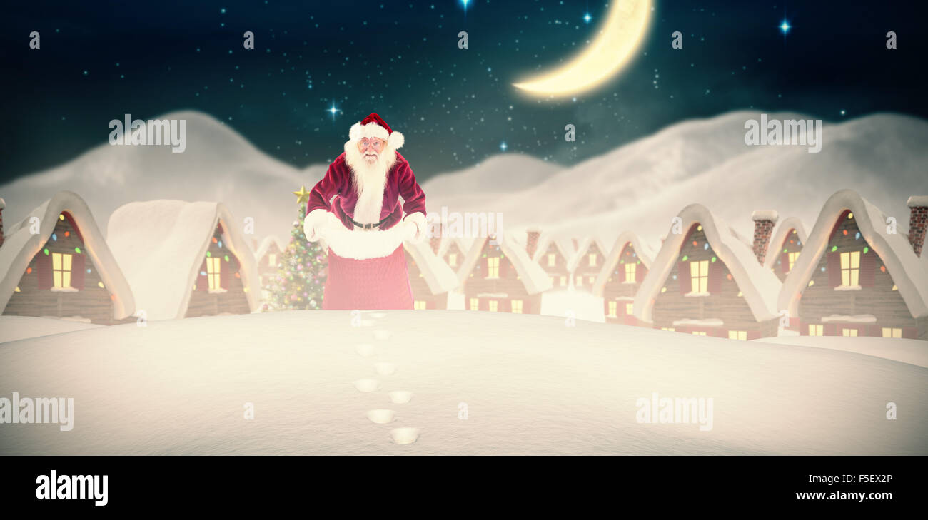 Composite image of santa open his red bag Stock Photo - Alamy