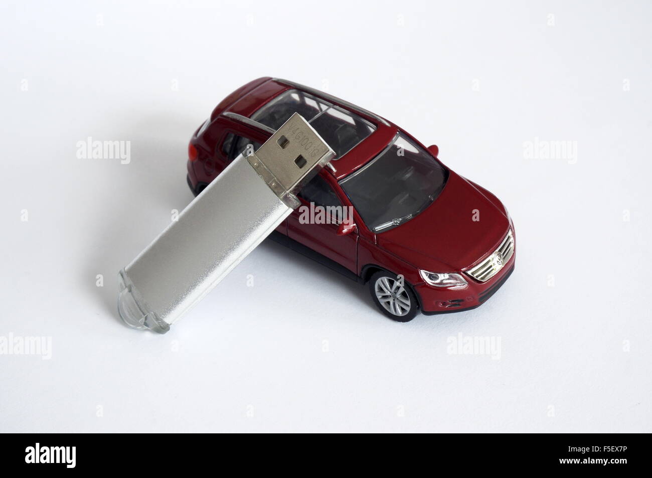 ILLUSTRATION- A Volkswagen car model 'VW Tiguan' next to an USB stick ...