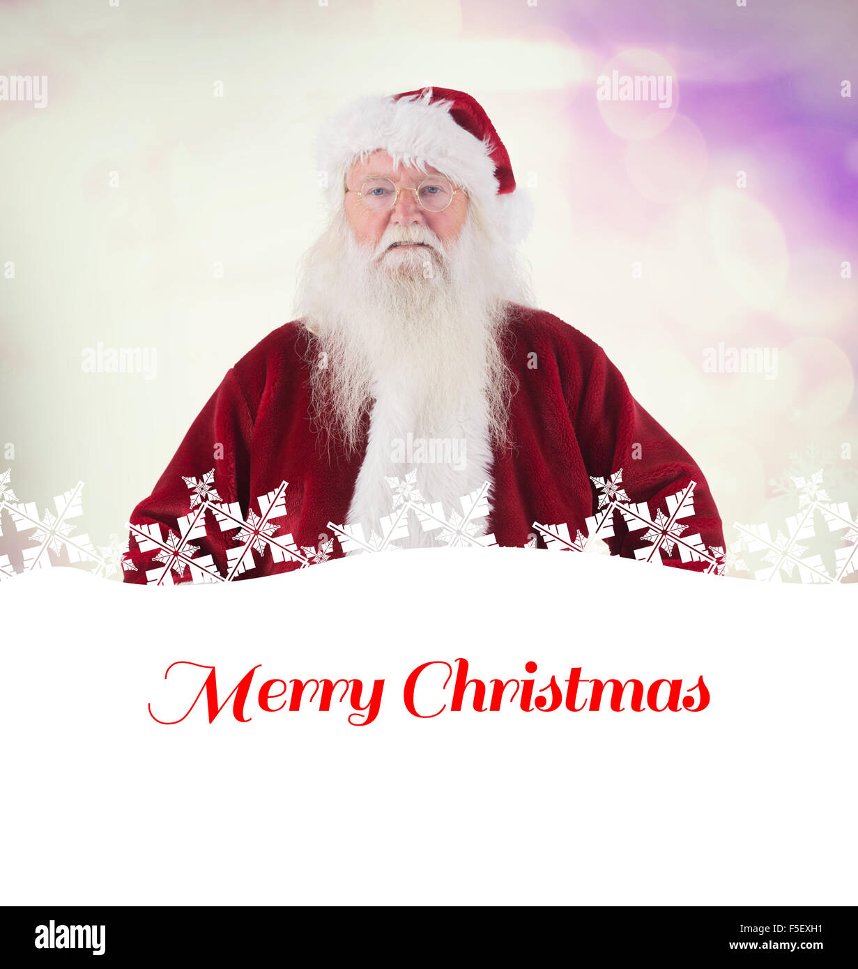 Composite image of santa claus measures his belly Stock Photo - Alamy