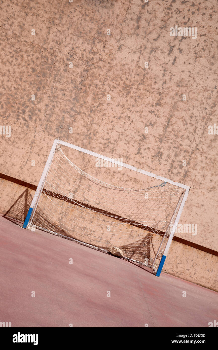 Football Goal with Stone Wall Behind Stock Photo - Alamy