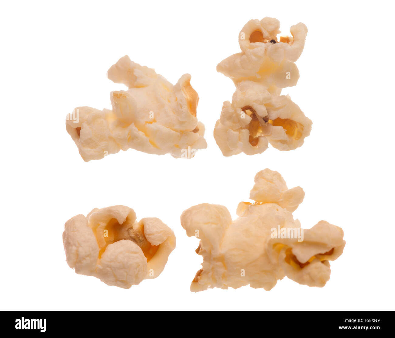 four pieces of popcorn studio cutout Stock Photo - Alamy