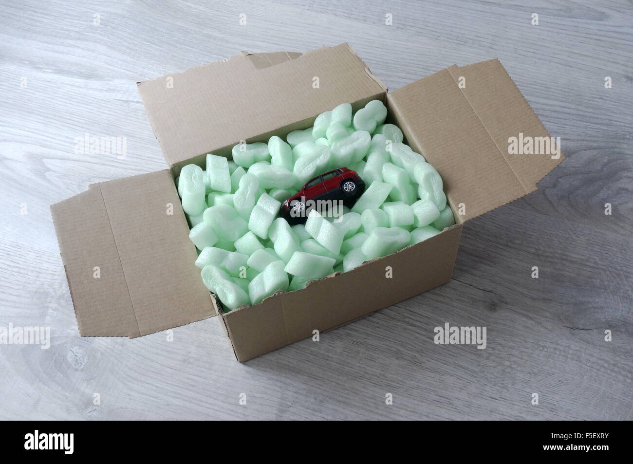 ILLUSTRATION - A Volkswagen car model 'VW Tiguan' in a polystyrene box ...