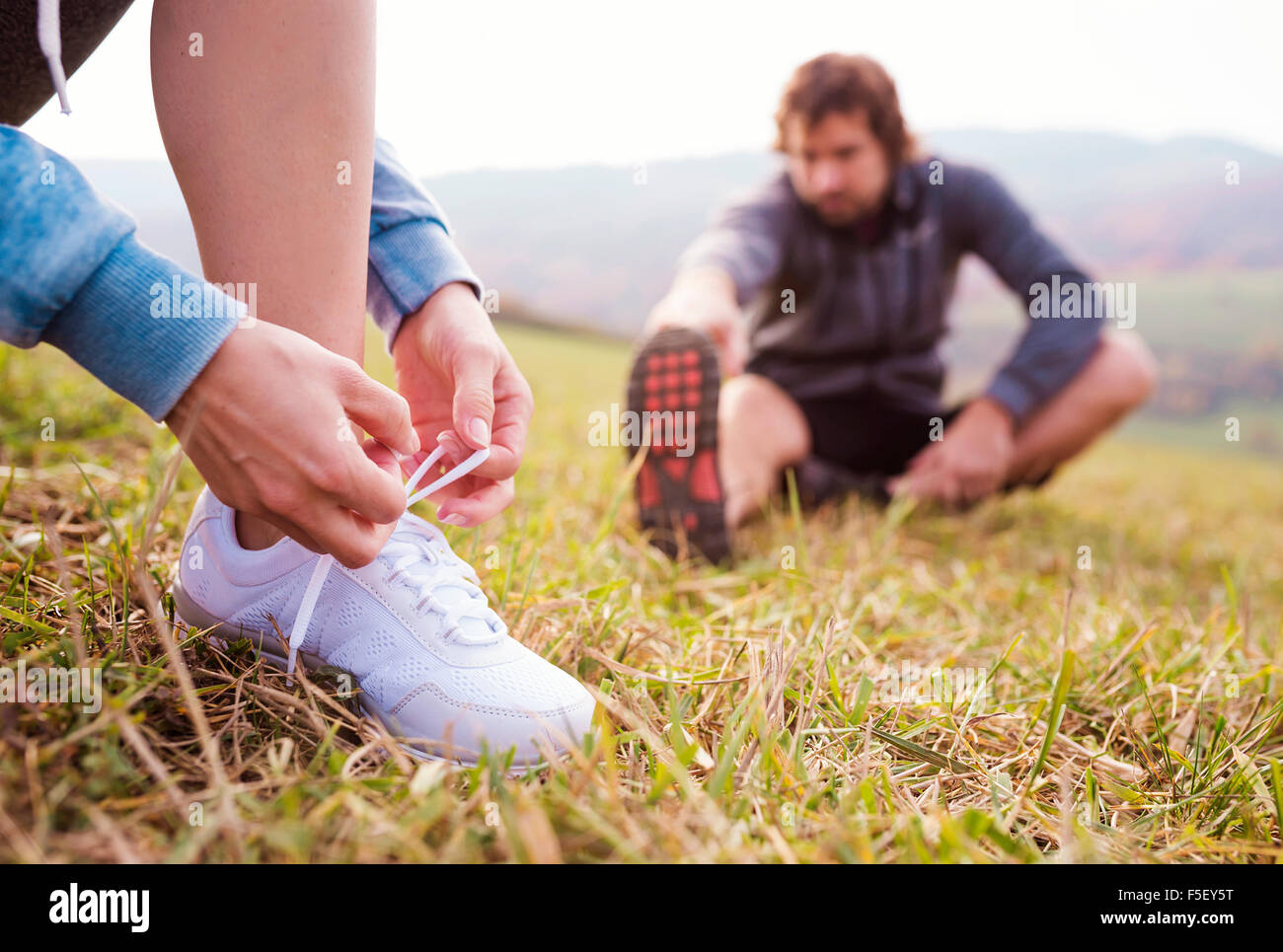 Beautiful couple running Stock Photo - Alamy