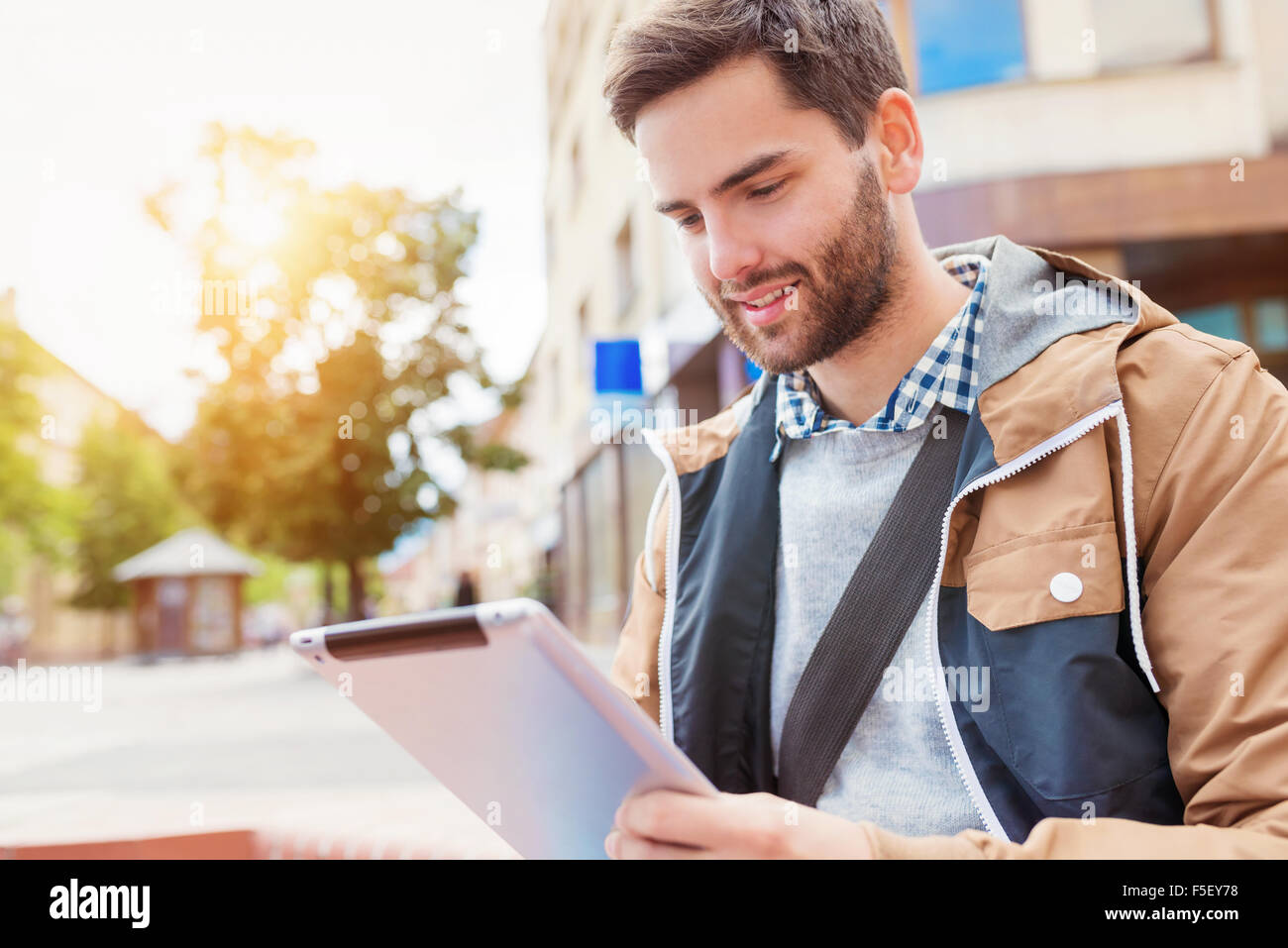 Man with tablet Stock Photo - Alamy