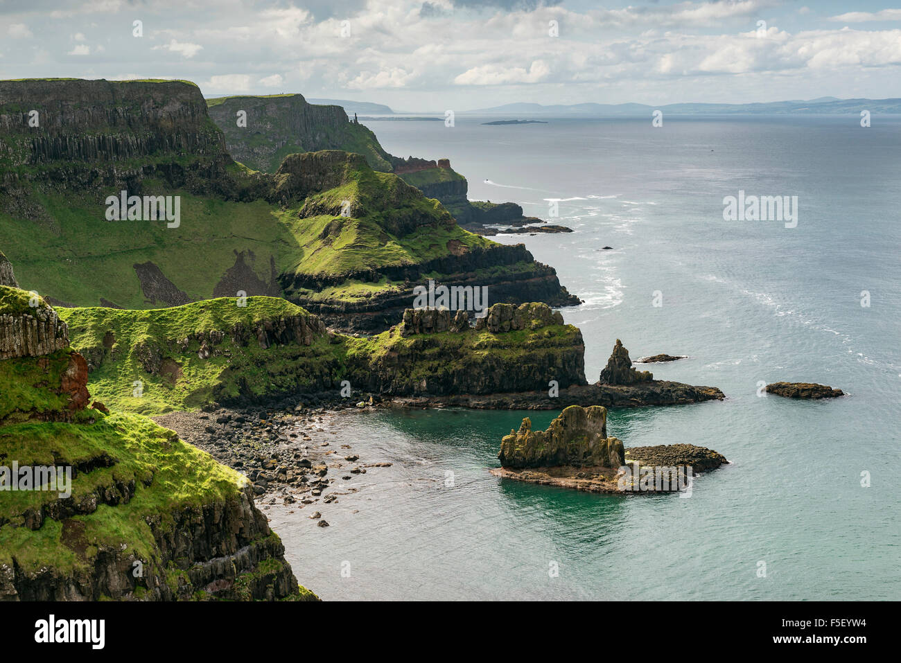 Basalt and red sandstone cliffs on Causeway Coast, County Antrim ...