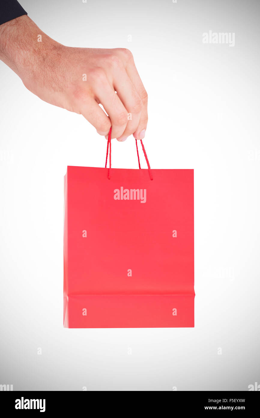 Hand holding bag hi-res stock photography and images - Alamy