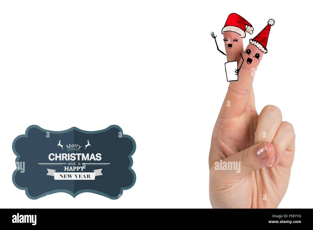 Composite image of christmas fingers Stock Photo - Alamy