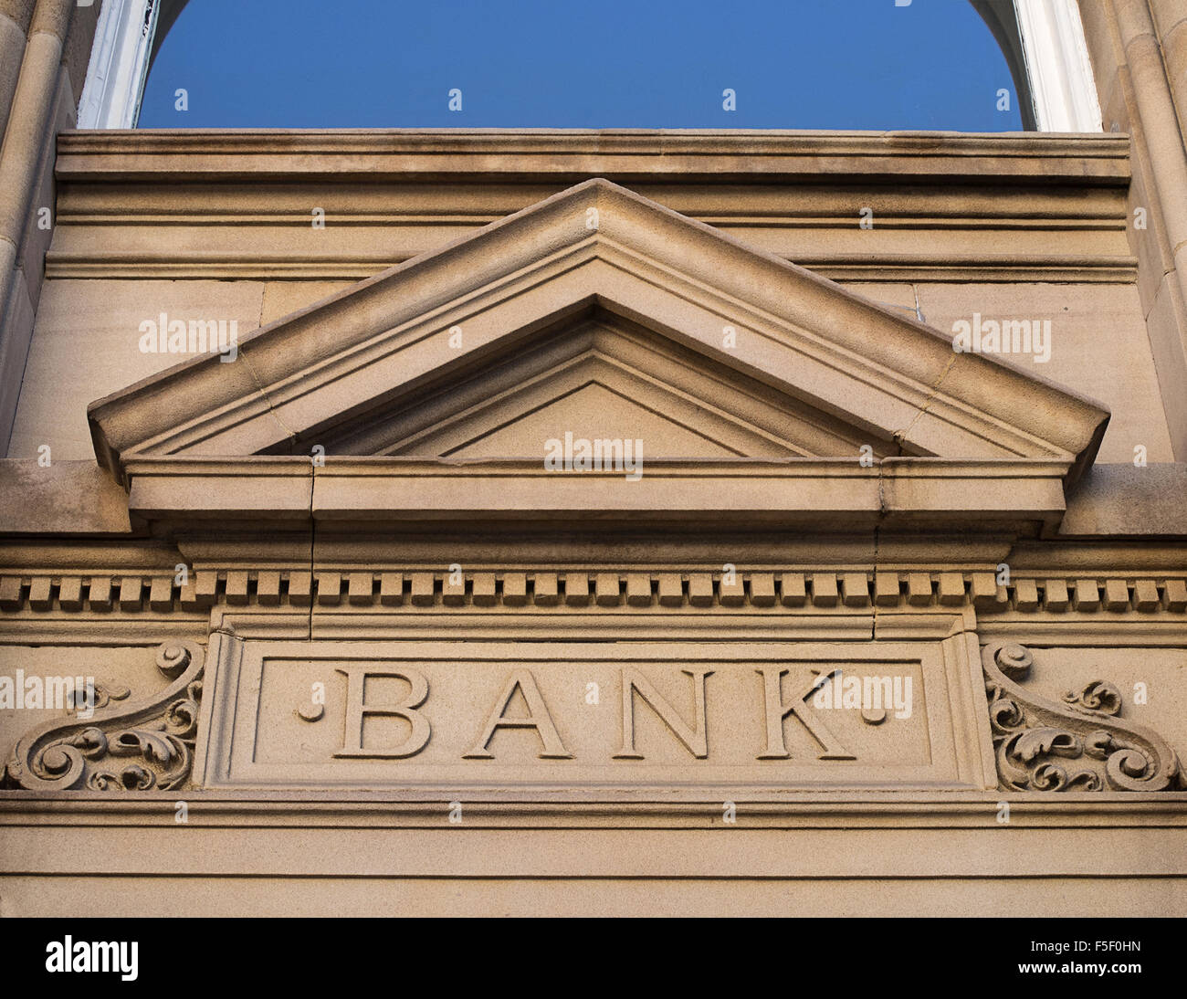 Stone bank sign Stock Photo - Alamy