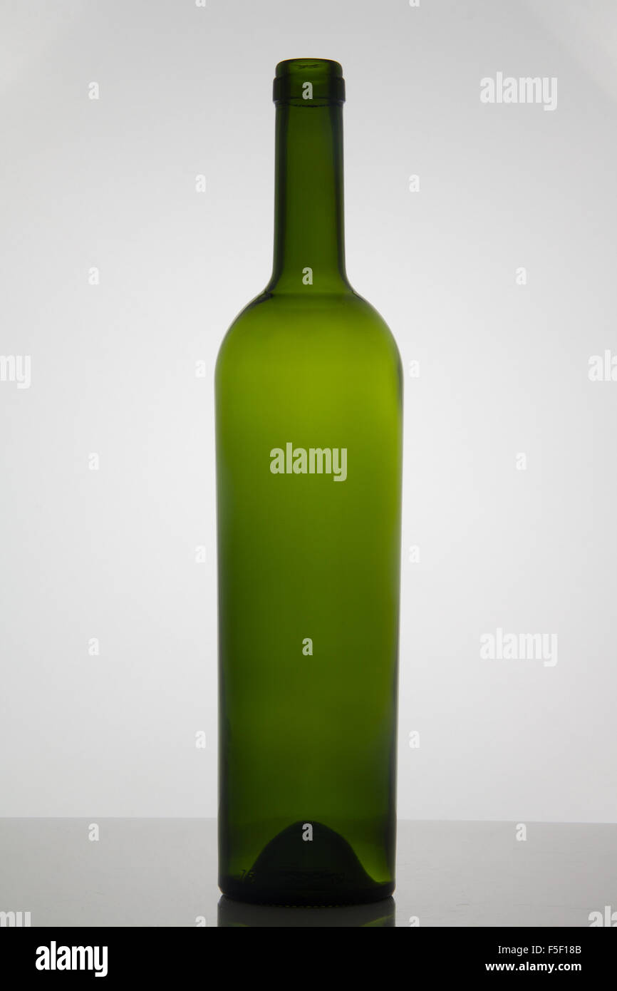 Empty bottle of wine on white background Stock Photo - Alamy