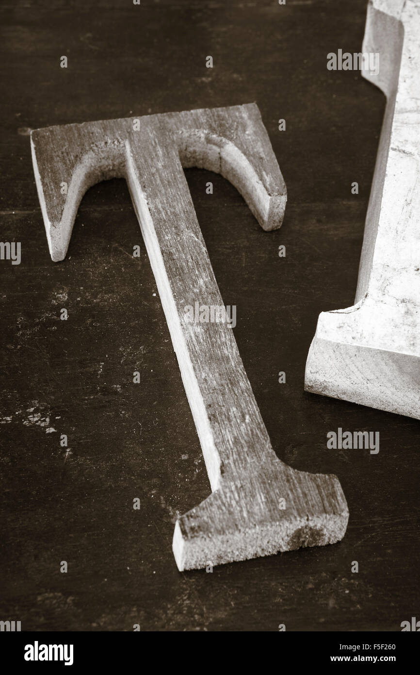 Old printing type font T made from wood vertical black and white Stock ...