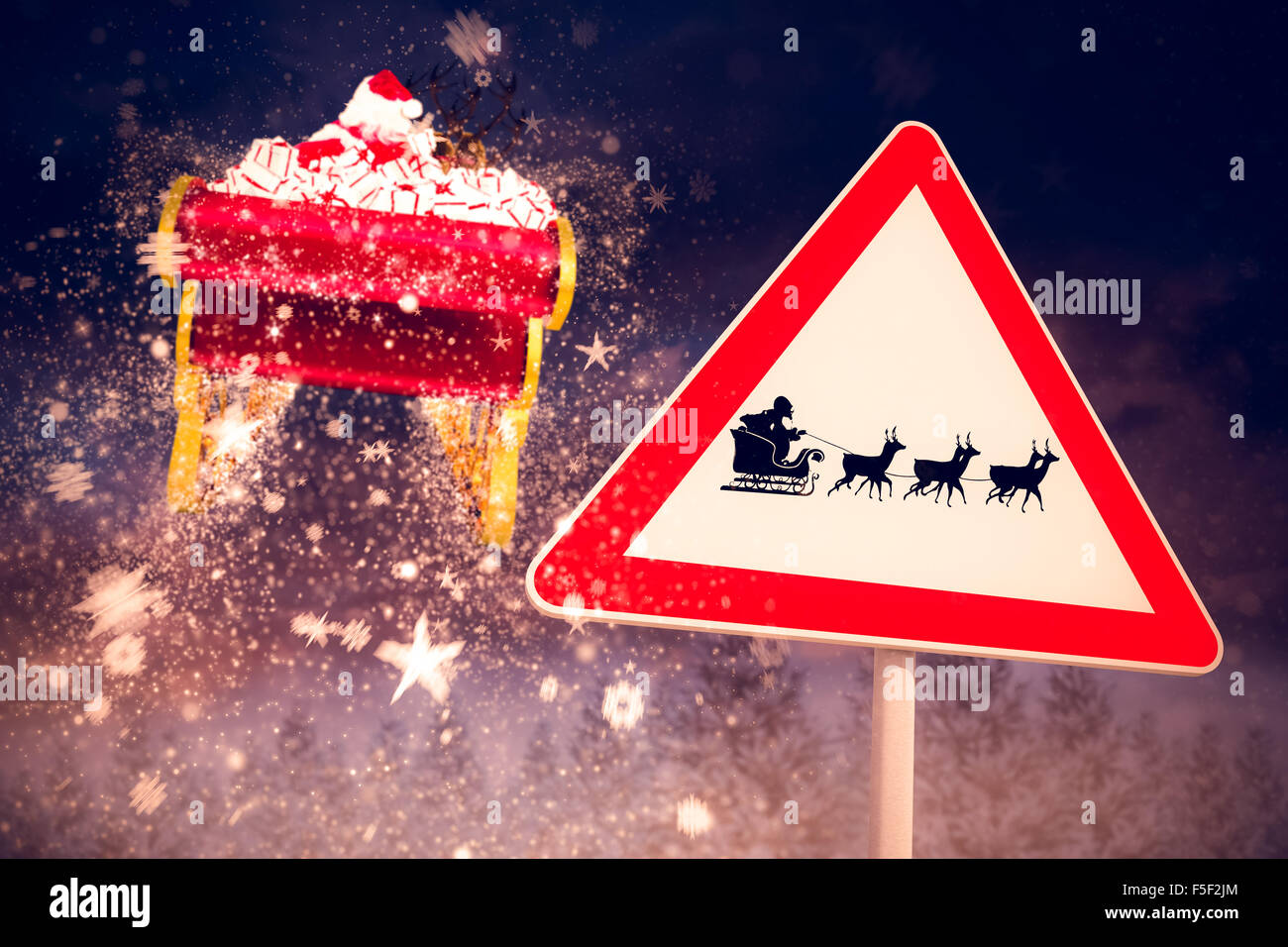 Composite image of christmas road sign Stock Photo - Alamy