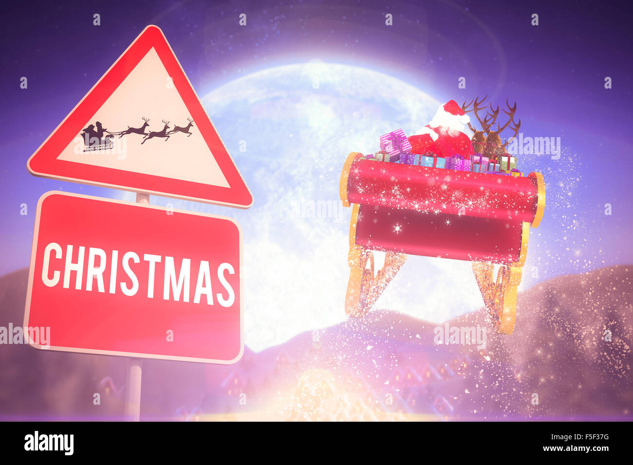 Composite image of christmas road sign Stock Photo - Alamy