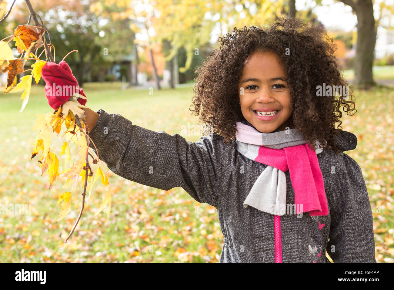 Child on autumn season portrait Stock Photo - Alamy