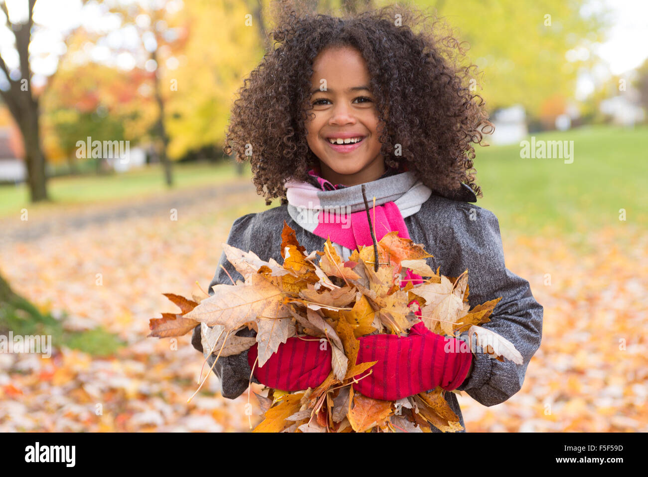Child on autumn season portrait Stock Photo - Alamy