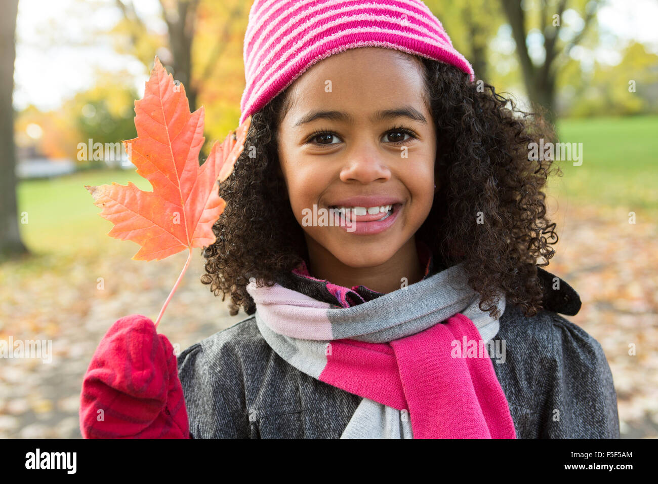 Child on autumn season portrait Stock Photo - Alamy