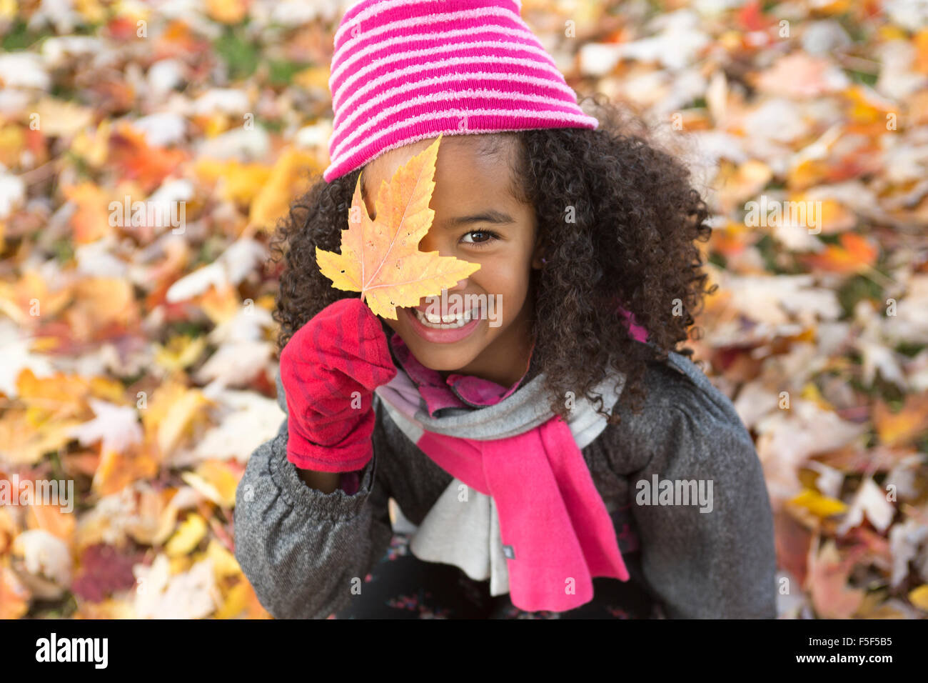 Child on autumn season portrait Stock Photo - Alamy