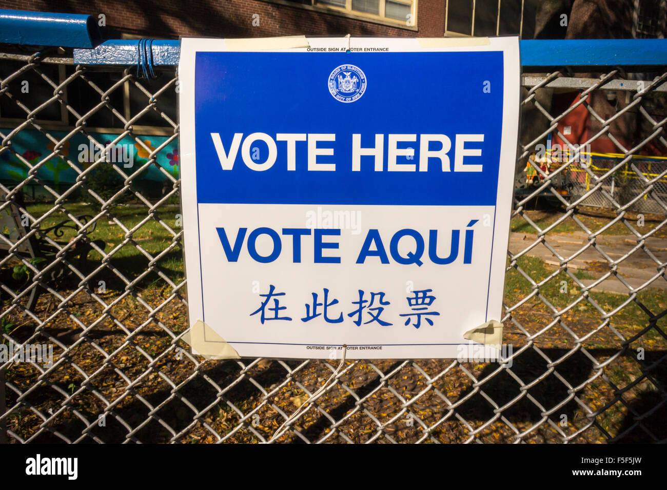 Trilingual signs directing voters to their polling stations in New York ...
