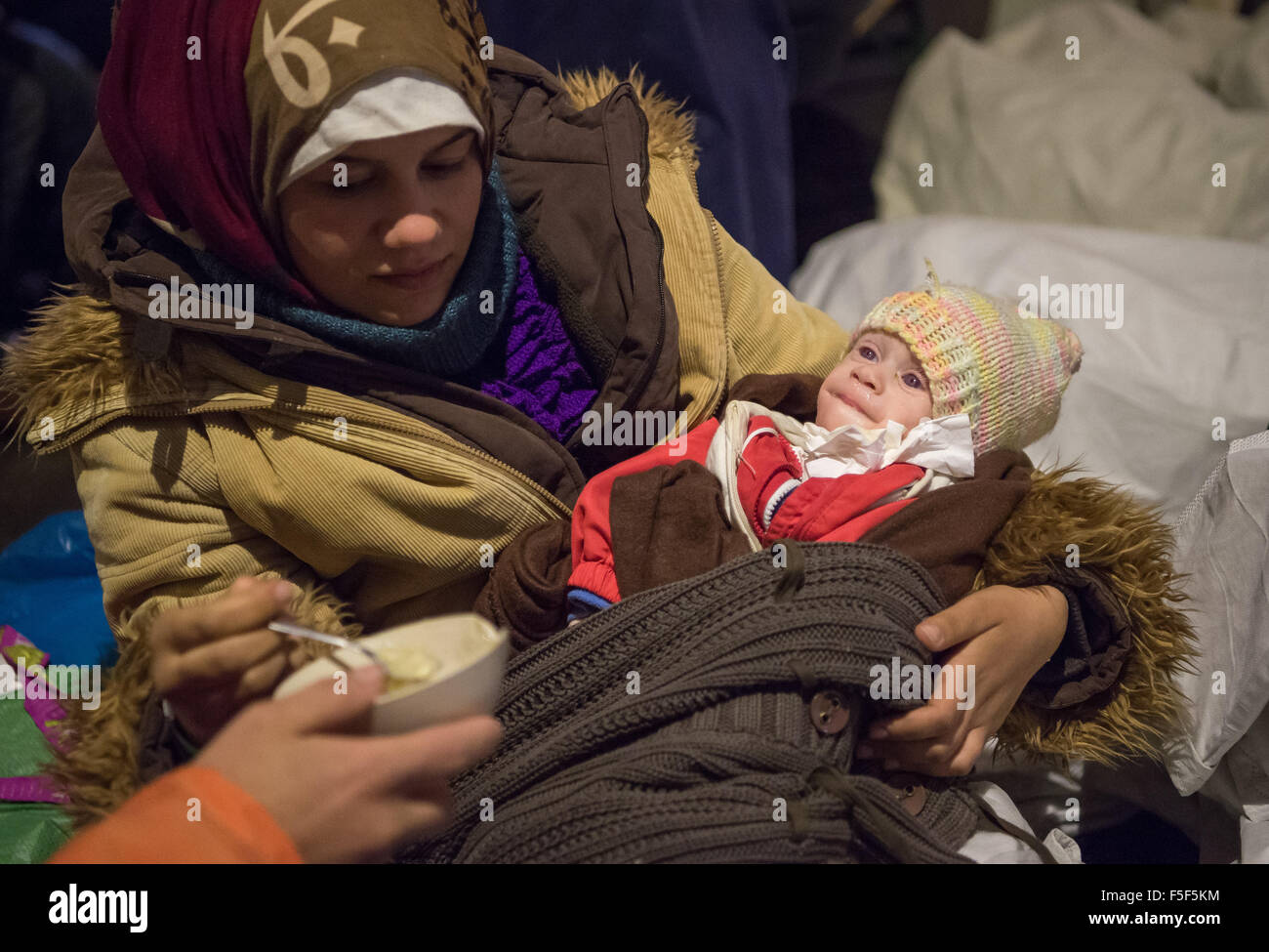 Mother border crossing child hi-res stock photography and images - Alamy