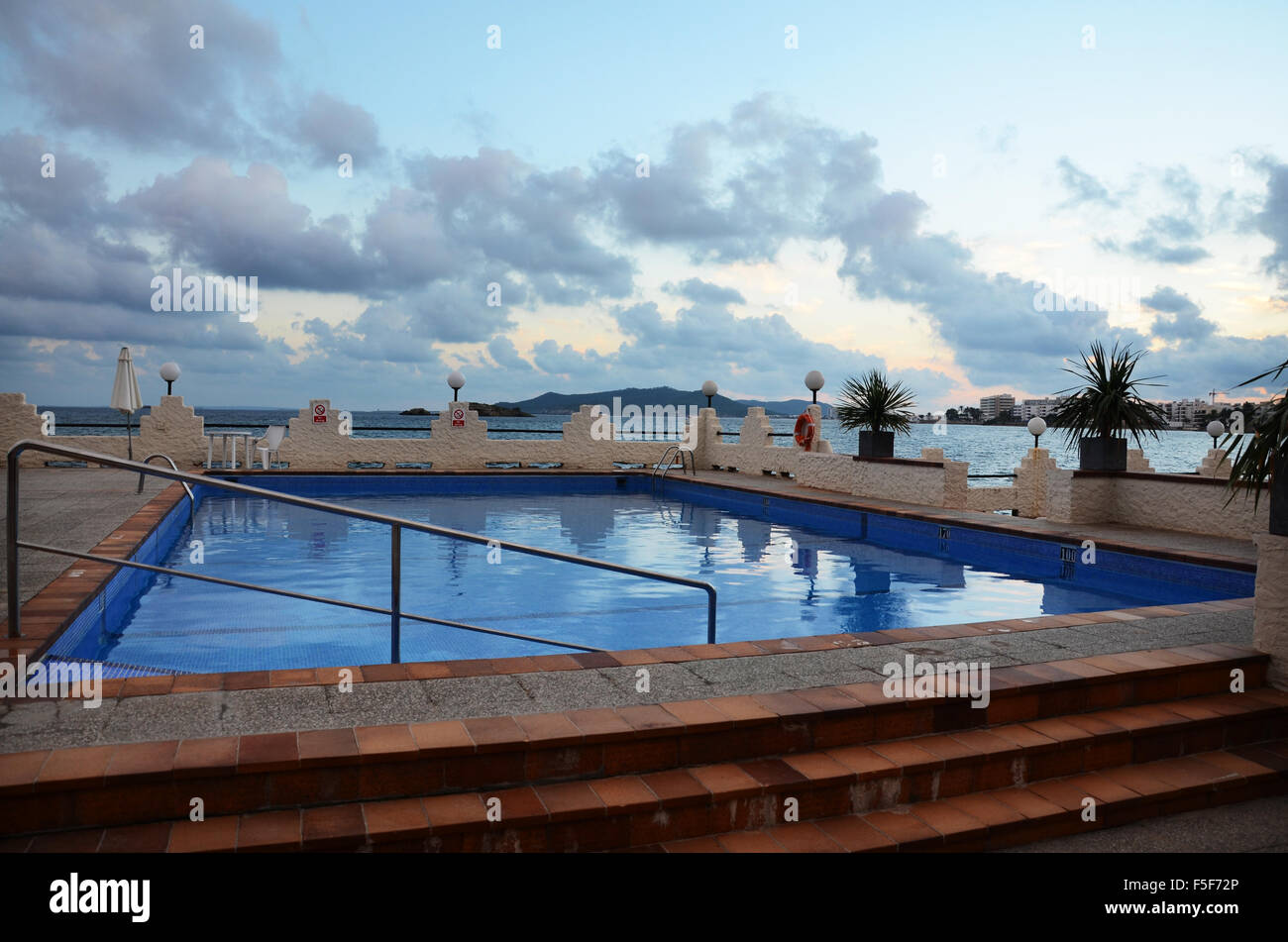 Pool by the seaside, Ibiza Spain Stock Photo - Alamy