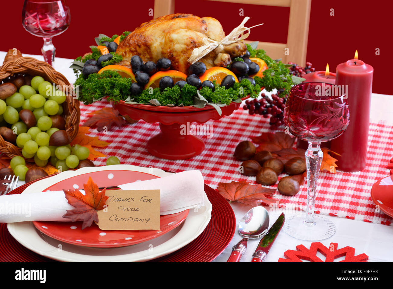 Red and white theme Thanksgiving table with individual place setting ...