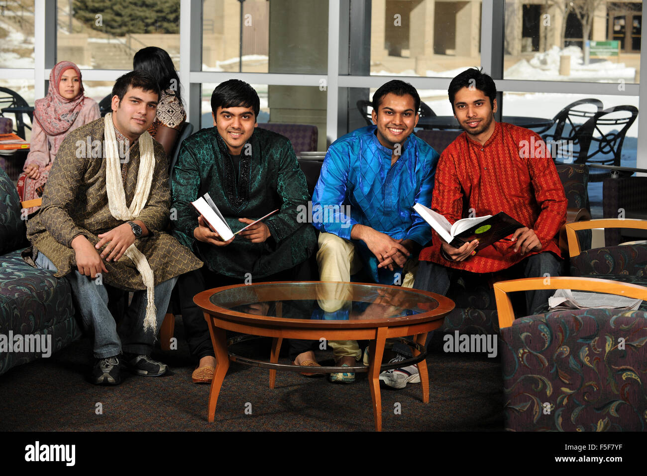 Group of Indian students in traditional attire inside college campus ...