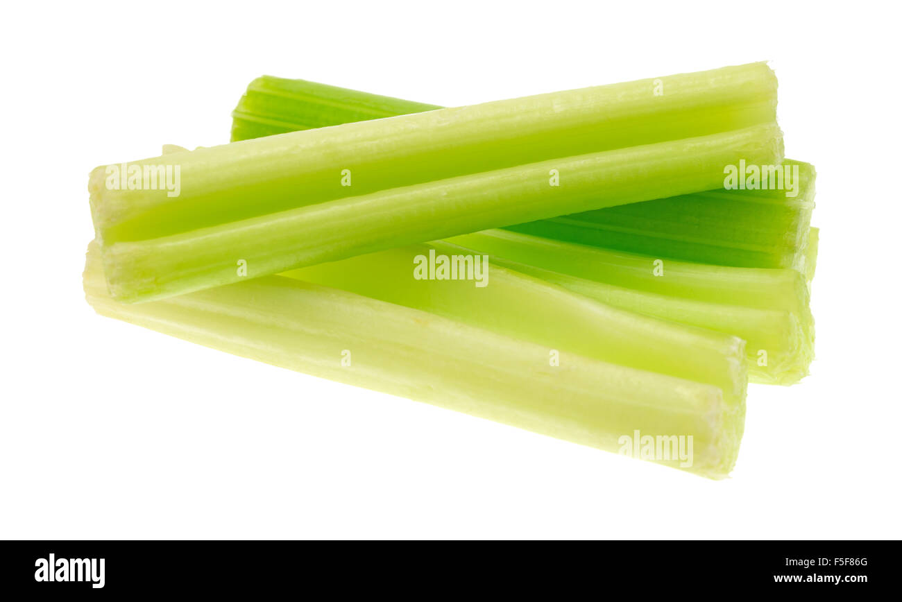 A small serving of celery sticks isolated on a white background Stock ...