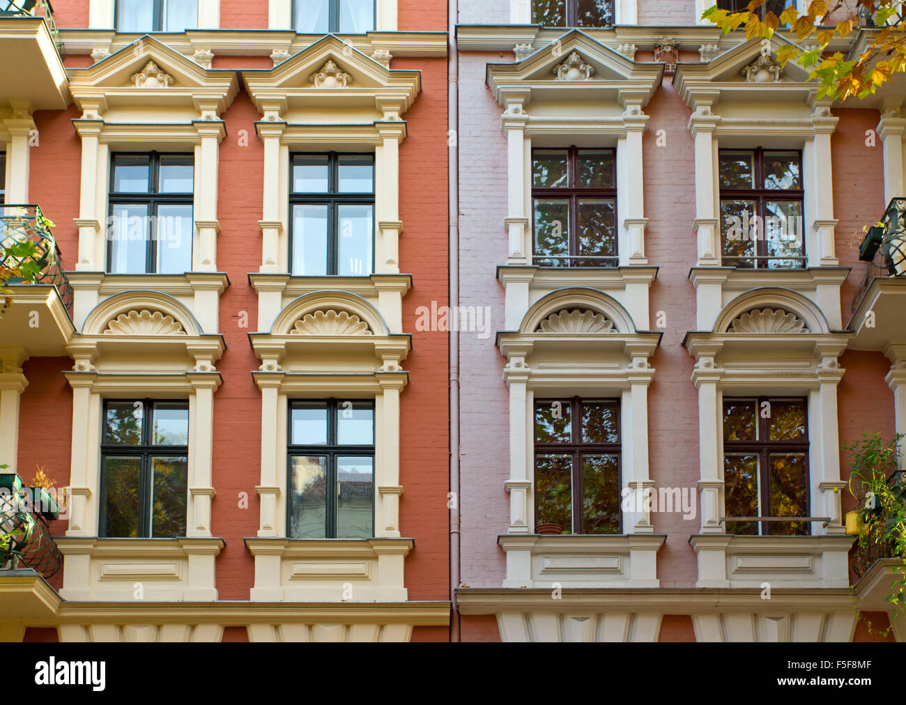 Windows of two rehabilitated townhouses in Berlin Stock Photo - Alamy
