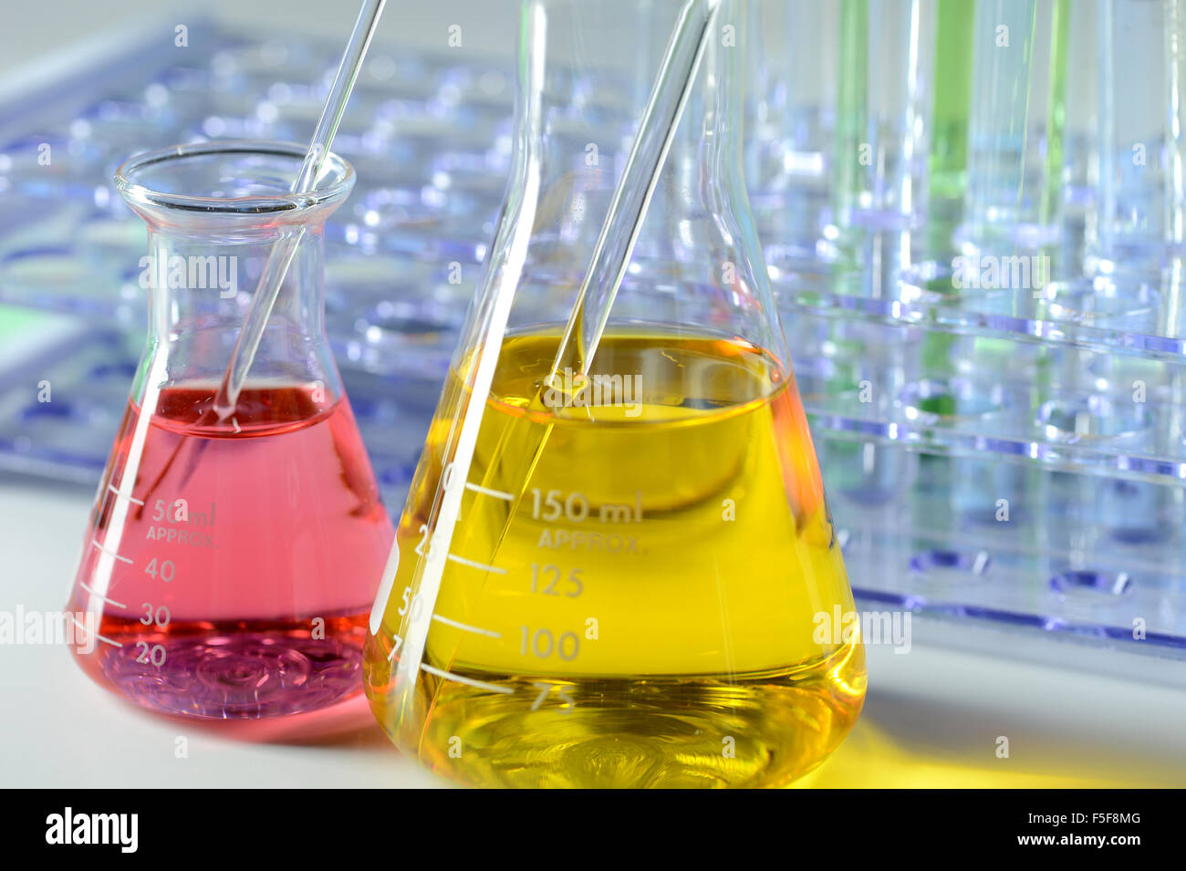 Laboratory flasks and test tubes with liquids of different colors Stock ...