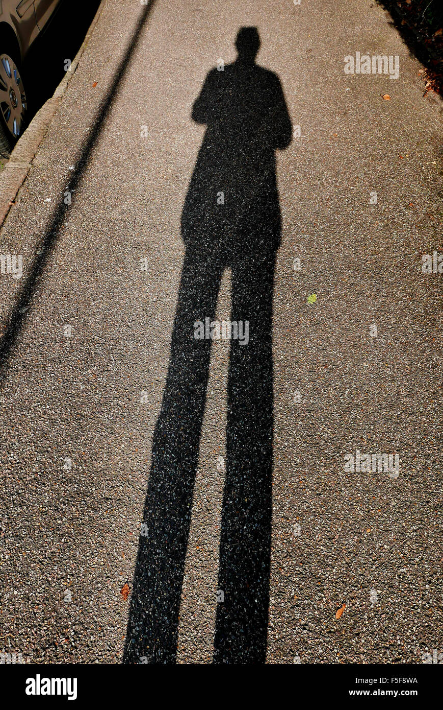 Ominous shadow hi-res stock photography and images - Alamy