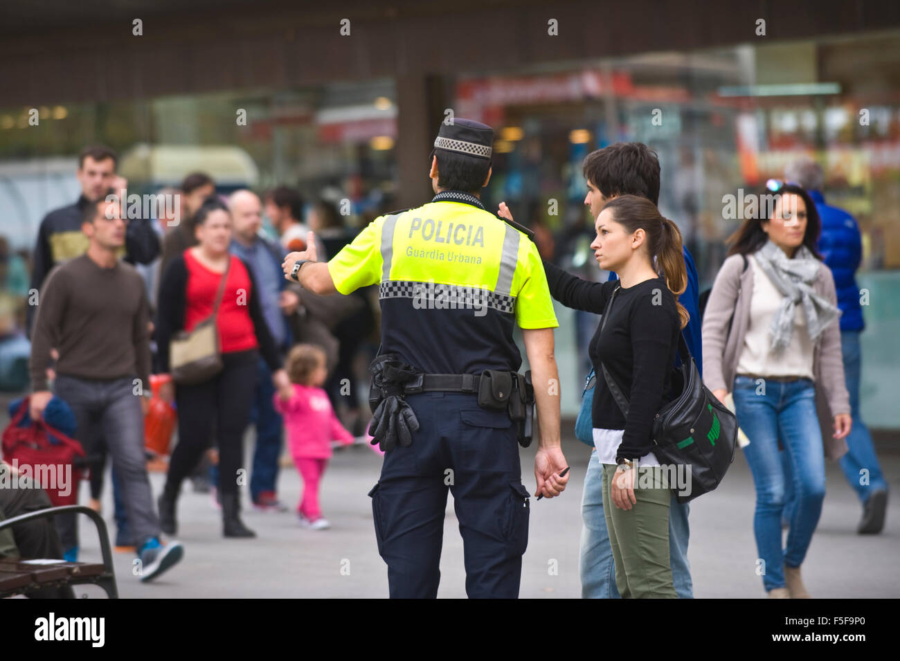 Police men giving tourist directions hi-res stock photography and ...