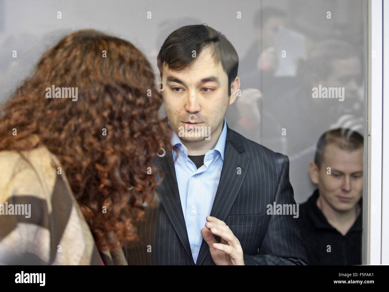 Two alleged Russian soldiers, Yevgeny Yerofeyev (C) speak with his the ...