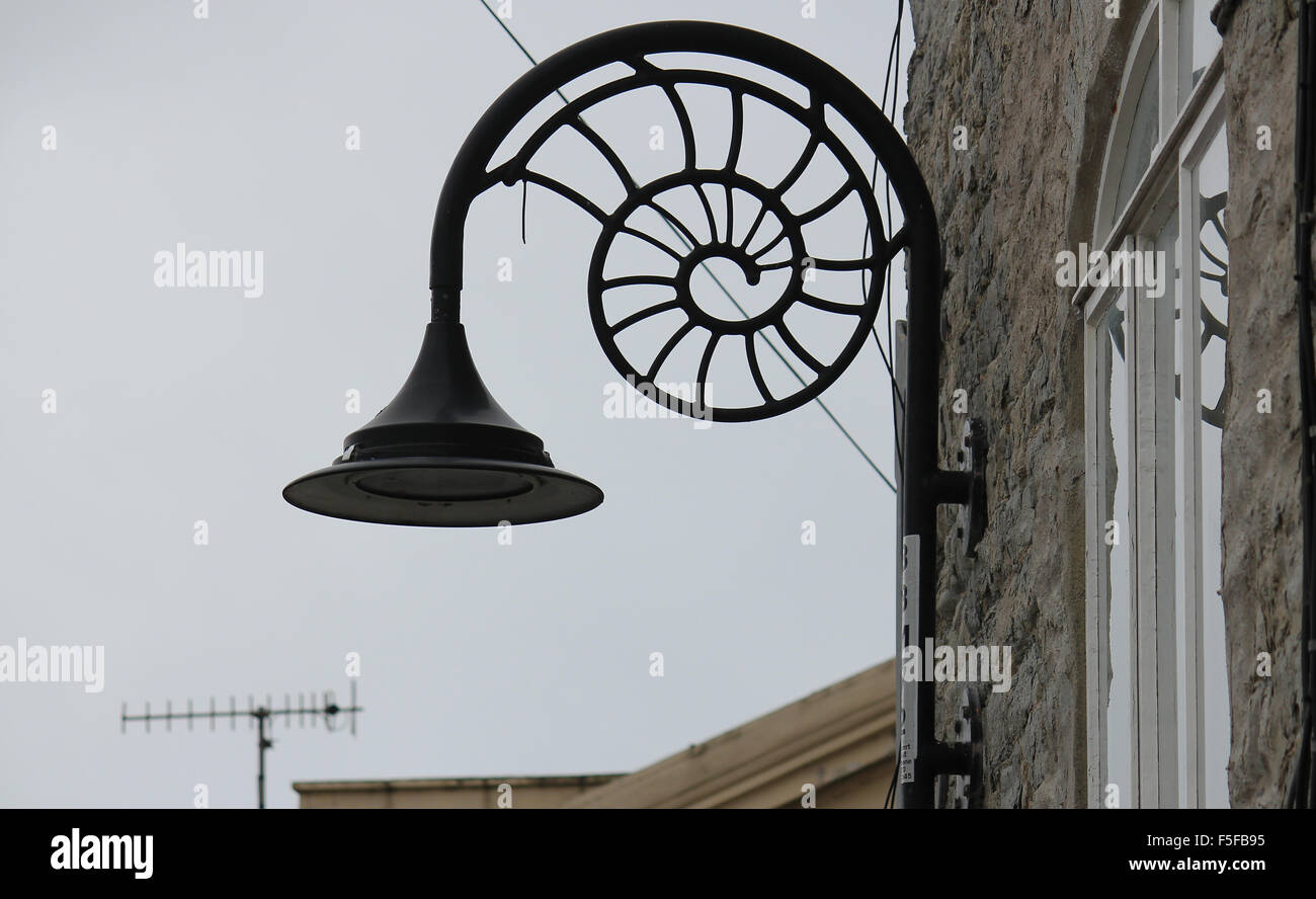 street light shaped like an ammonite fitting Stock Photo - Alamy