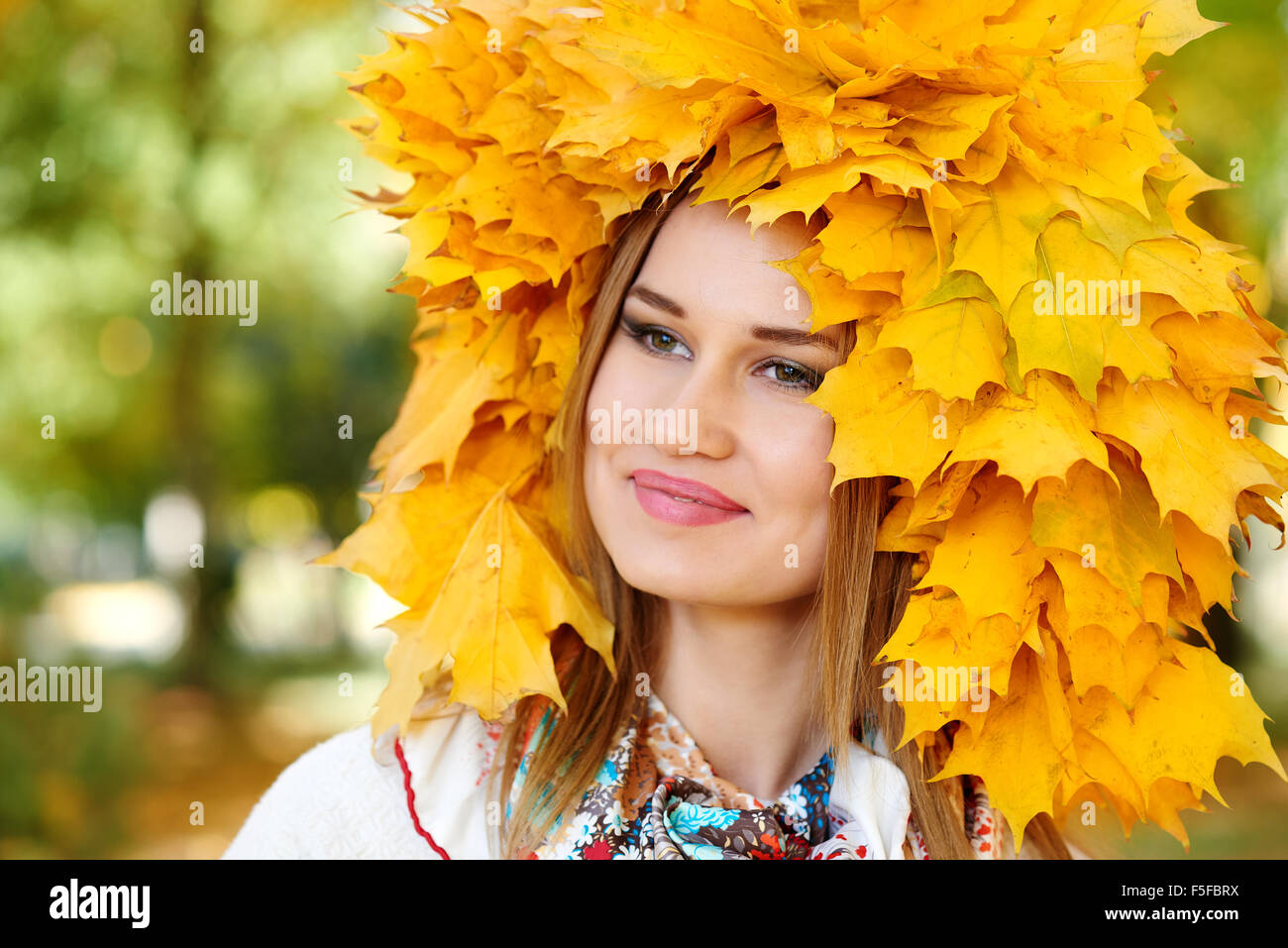 girl portrait with leaves on head in autumn Stock Photo - Alamy