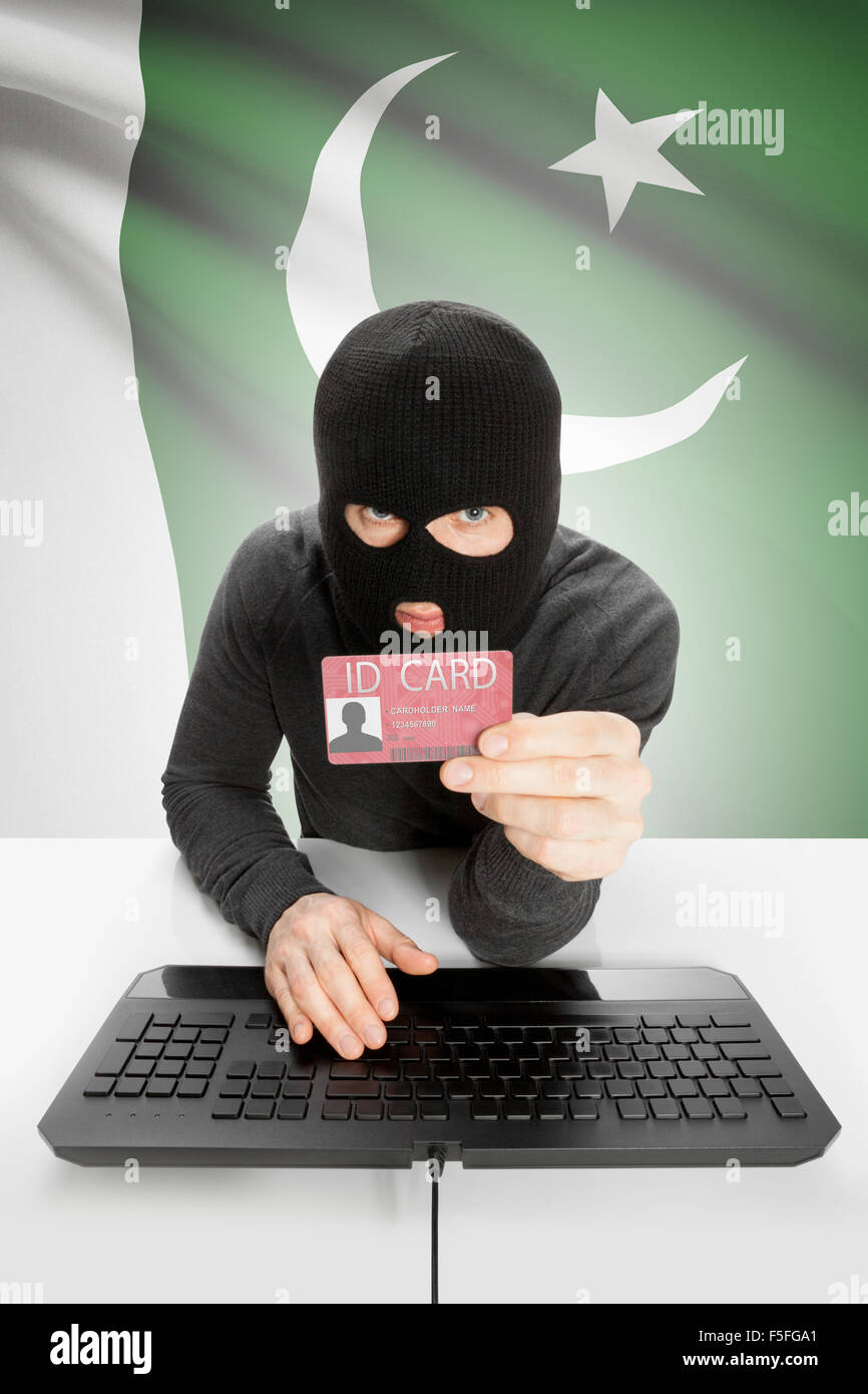 Hacker with ID card in hand and flag on background - Pakistan Stock ...